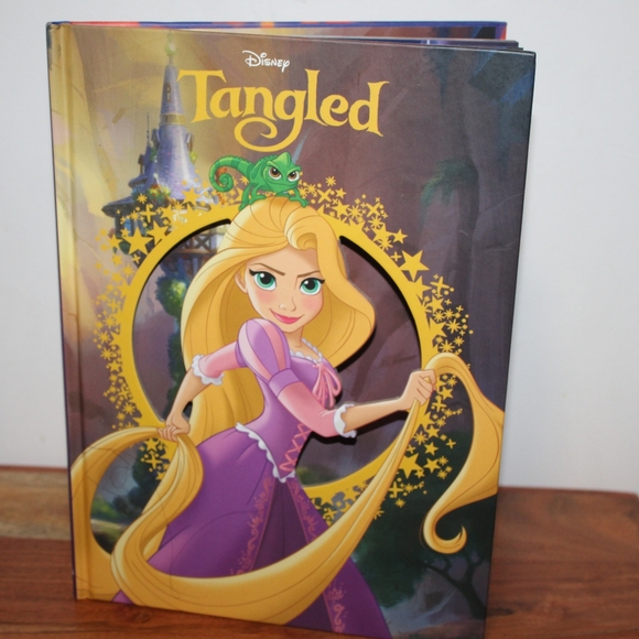 Disney | Other | Disney Tangled Book With Purple And Yellow Cover ...